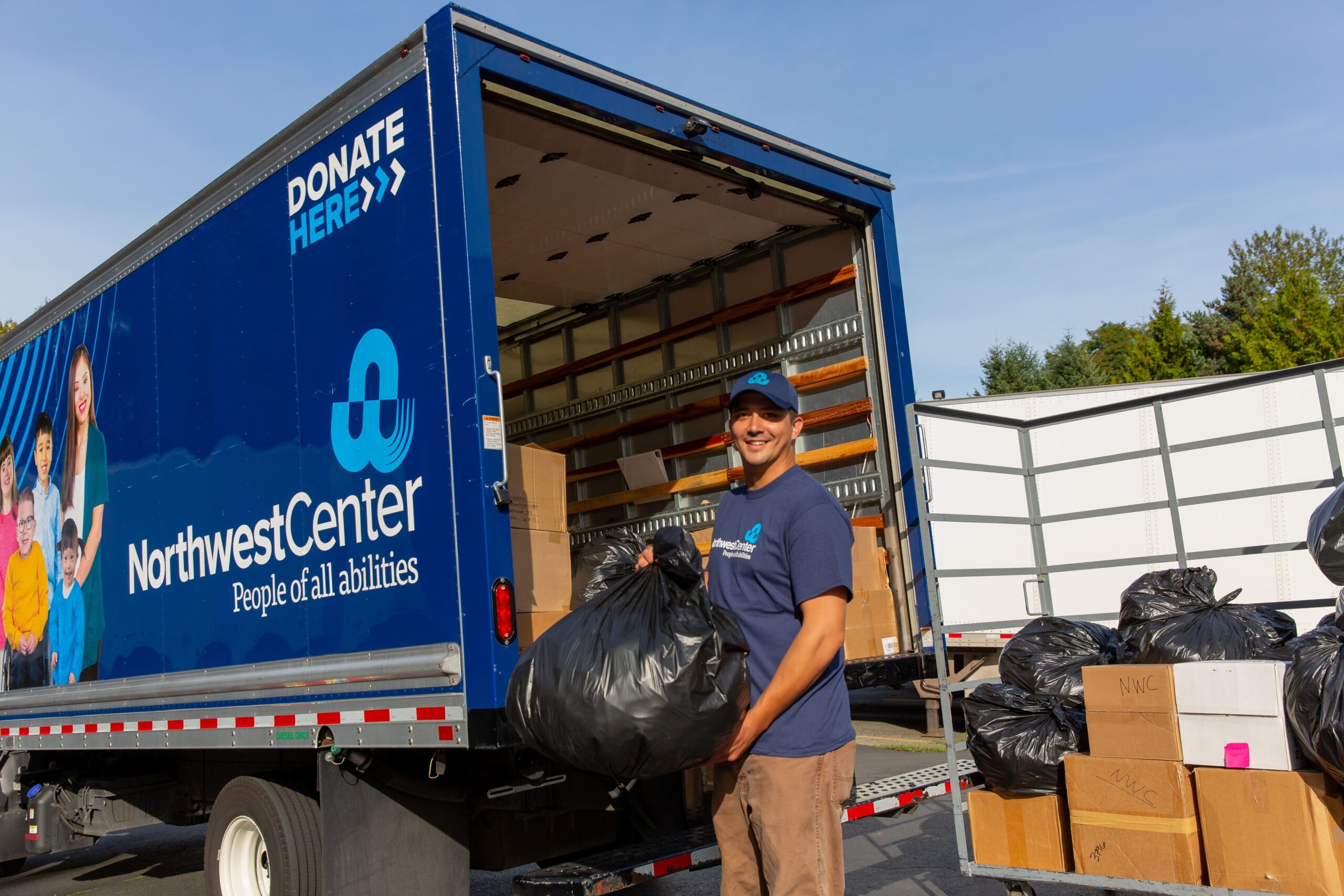 Let The Big Blue Truck Help with Your Spring Cleaning - Northwest Center